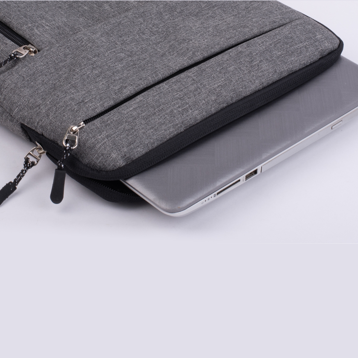 Laptop Sleeve with pull out handle | 2 outside zipper pockets ...